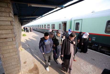 Iraqis travel by train from Fallujah city to Baghdad, Iraq - 29 Nov ...