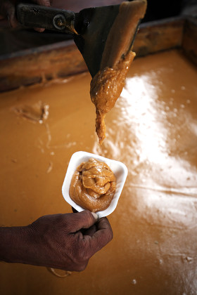 Indian Worker Puts Freshly Prepared Gud Editorial Stock Photo - Stock ...