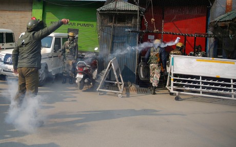 Indian Police Officer Throws Tear Smoke Editorial Stock Photo - Stock ...