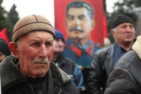 GEORGIAN STALINISTS HOLD RED FLAGS PORTRAITS Editorial Stock Photo ...