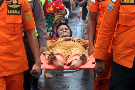 Elderly Woman Carried By Indonesian Rescuers Editorial Stock Photo ...