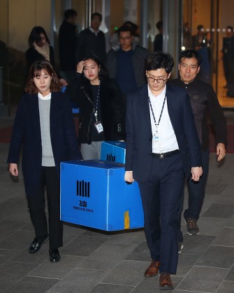 Prosecution Investigators Carry Boxes Containing Confiscated Editorial ...