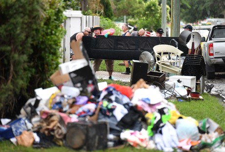 RESIDENTS HELPERS REMOVE FLOOD-DAMAGED ITEMS HOMES Editorial Stock ...