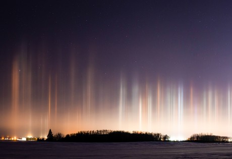 photographer captures rare light pillars phenomenon alberta Stock ...