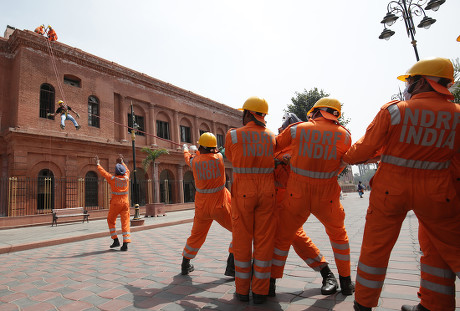 Volunteer Acting Victim Evacuated Building By Editorial Stock Photo ...