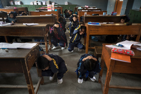 Nepalese School Children Crouch Under Their Editorial Stock Photo ...