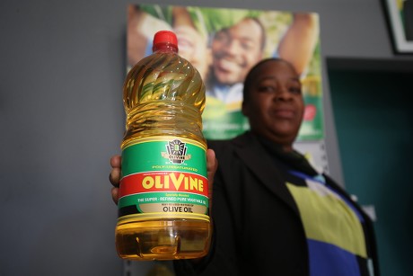 Worker Holds Bottle Cooking Oil Surface Editorial Stock Photo - Stock ...