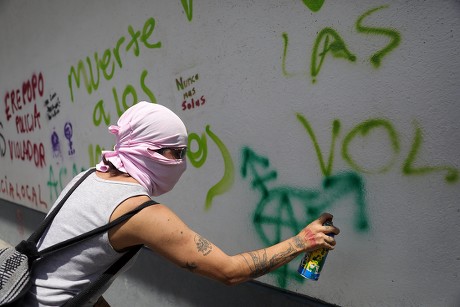 Woman Spray Paints Graffiti On Wall Editorial Stock Photo - Stock Image ...
