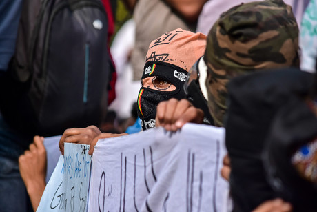 Masked Protester Looks On During Demonstration Editorial Stock Photo ...