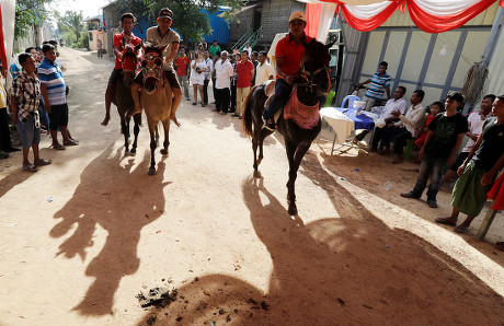 Cambodian Men Ride Their Horses During Editorial Stock Photo - Stock ...