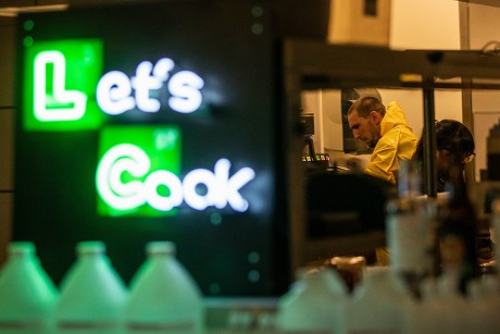 Barman Wearing Biohazard Suit Prepares Cocktail Editorial Stock Photo ...