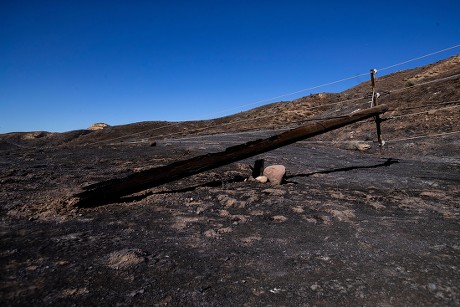 Electric Pole Lays On Scorched Ground Editorial Stock Photo - Stock ...