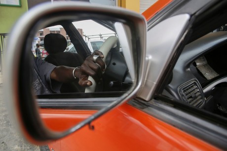 Red Taxi Cab Driver Navigates Busy Editorial Stock Photo - Stock Image ...