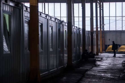 Migrant Man Sits By Container Apartments Editorial Stock Photo - Stock ...