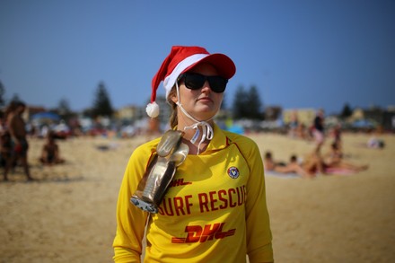 Lifeguard Wearing Christmas Outfit Poses On Editorial Stock Photo ...
