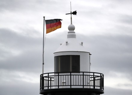 German Flag Wind Vane Atop Light Editorial Stock Photo - Stock Image ...