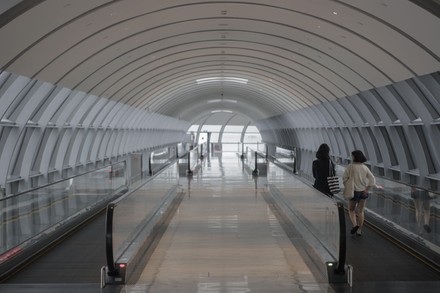 Two Women Walk On Travelator Through Editorial Stock Photo - Stock ...