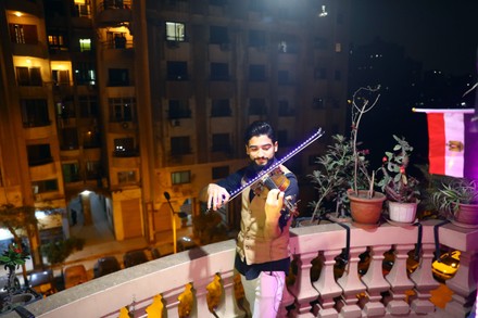 Egypt Cairo Curfew Balcony Concert - 31 Mar 2020 Stock Pictures ...