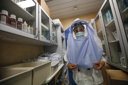Medical Workers Puts On Personal Protective Editorial Stock Photo ...