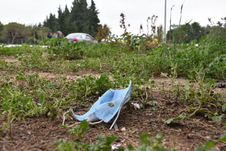 Discarded Face Mask Lies On Ground Editorial Stock Photo - Stock Image ...