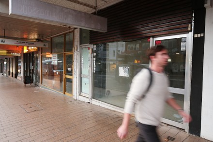 Man Walks Past Closed Shop Suburb Editorial Stock Photo - Stock Image ...