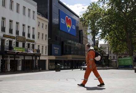 Man Walks Past Screen Displaying Words Editorial Stock Photo - Stock ...