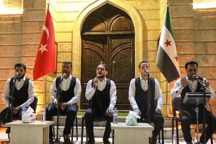 __COUNT__ Syrian singers chant religious prayers during the Muslims ...