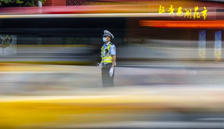 Police Officer Wearing Mask Regulates Traffic Editorial Stock Photo ...