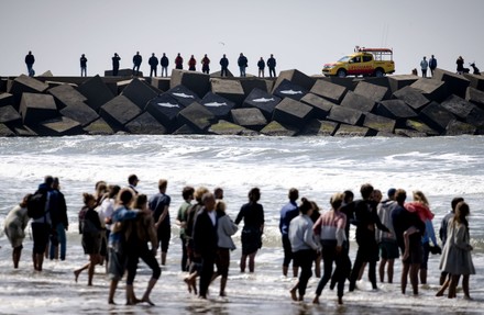 Attendees Jump Over Waves During Funeral Editorial Stock Photo - Stock ...