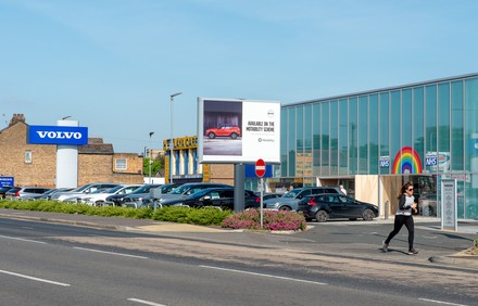 Woman Jogs Past Volvo Car Showroom Editorial Stock Photo - Stock Image ...