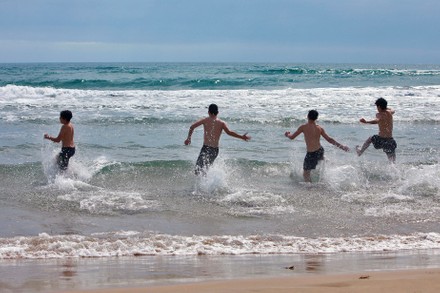 Young Boys Splash Into Waves Beach Editorial Stock Photo - Stock Image ...