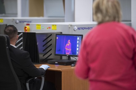 Employee Checks Thermo Scanner Visitors Wearing Editorial Stock Photo ...