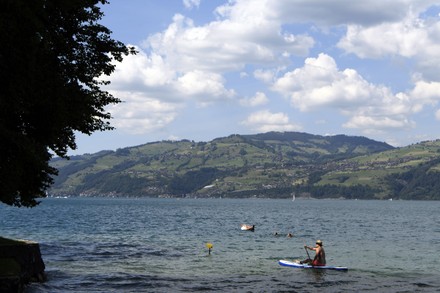 People Enjoy Sun On Lake Thun Editorial Stock Photo - Stock Image ...