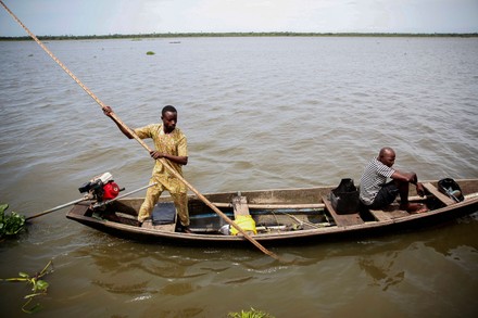 Nigerian Man Moves Pirogue Captured Live Editorial Stock Photo - Stock ...