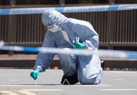 Police Forensics Swabbing Evidence On Road Editorial Stock Photo ...