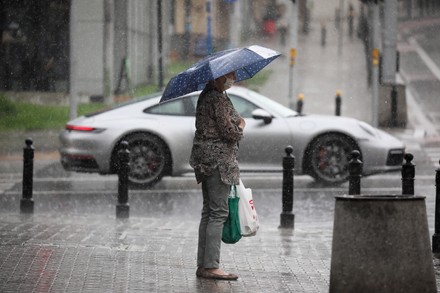Woman Shields Herself Heavy Rain Umbrella Editorial Stock Photo - Stock ...