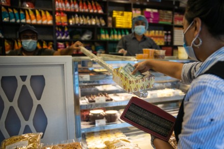 Shopkeeper Receives Payment Customer Through Container Editorial Stock ...