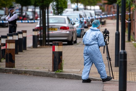 Forensic Investigator Moves Camera Equipment On Editorial Stock Photo ...