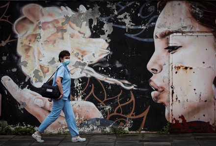 Paramedic Walks Past Graffiti While On Editorial Stock Photo - Stock ...