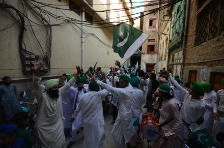 Sikh hold national flags, Peshawar, Khyber Pakhtunkhwa, Pakistan - 14 ...