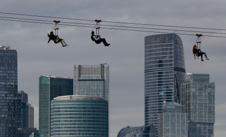 People Descend On Steel Ropes Across Editorial Stock Photo - Stock ...
