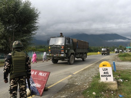 Paramilitary Soldier Looks On Army Convoy Editorial Stock Photo - Stock ...