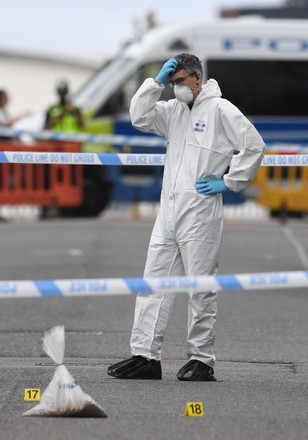 Forensic Officer Gathers Evidence Inside Cordon Editorial Stock Photo ...
