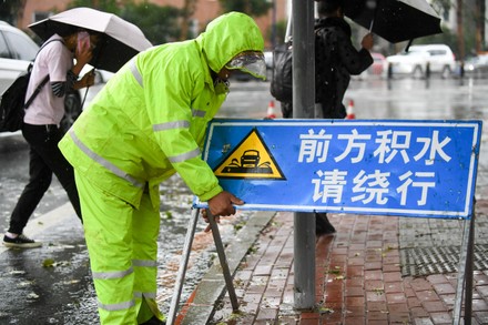 Staff Member Sets Warning Sign On Editorial Stock Photo - Stock Image ...