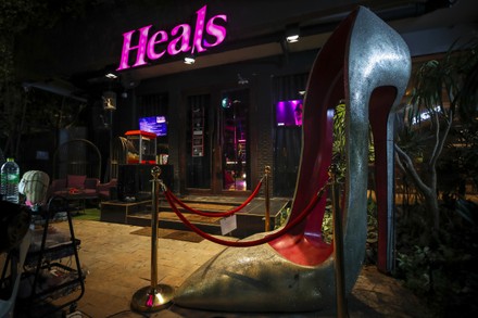 LARGE HIGH HEEL SHOE OUTSIDE ENTRANCE Editorial Stock Photo - Stock ...