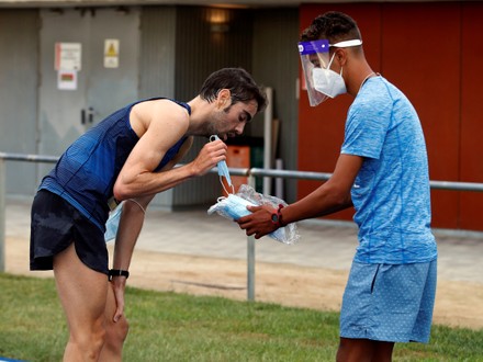 Volunteer Gives Face Mask Runner During Editorial Stock Photo - Stock ...