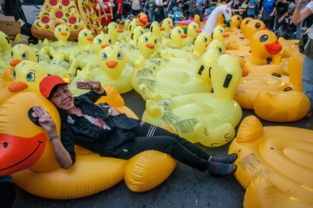 Protester Lying On Inflatable Rubber Duck Editorial Stock Photo - Stock ...