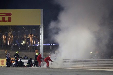 Track Marshals Extinguish Flames On Crash Editorial Stock Photo - Stock ...