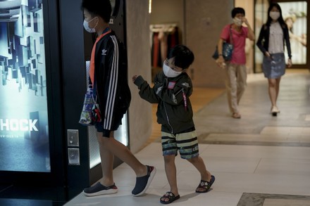 Two Young Boys Walk Through Mall Editorial Stock Photo - Stock Image ...