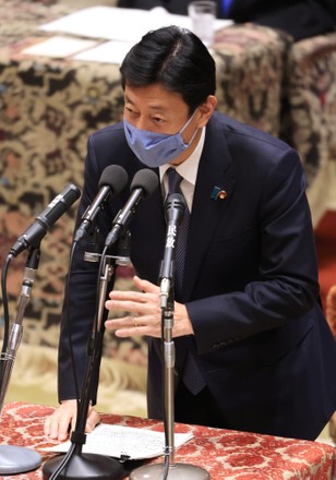 Japanese Fiscal Policy Minister Yasutoshi Nushimura attends Lower House ...